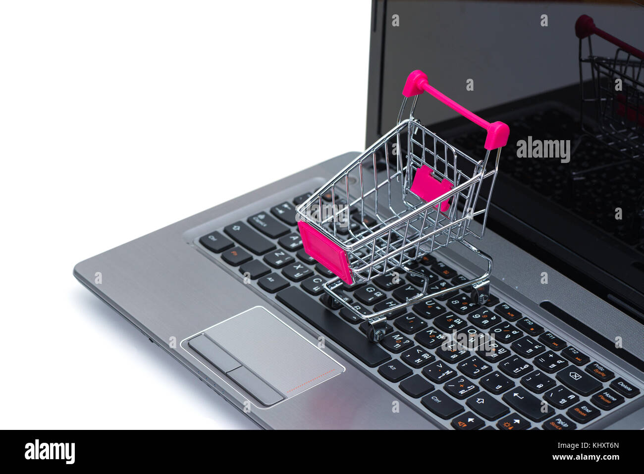 Shopping cart or supermarket trolley with laptop notebook isolated on ...