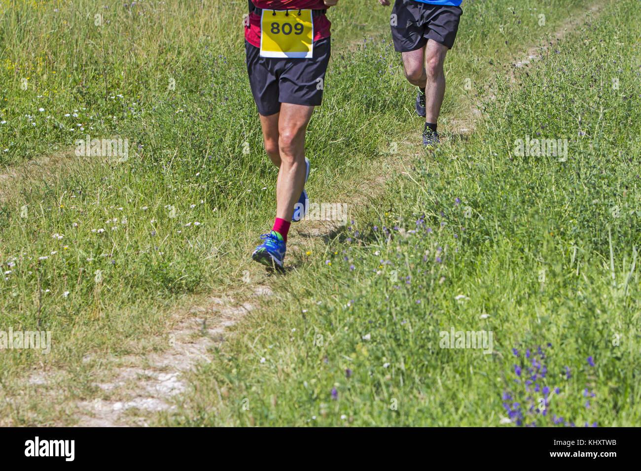 Two athletes Running marathon outdoors Stock Photo - Alamy