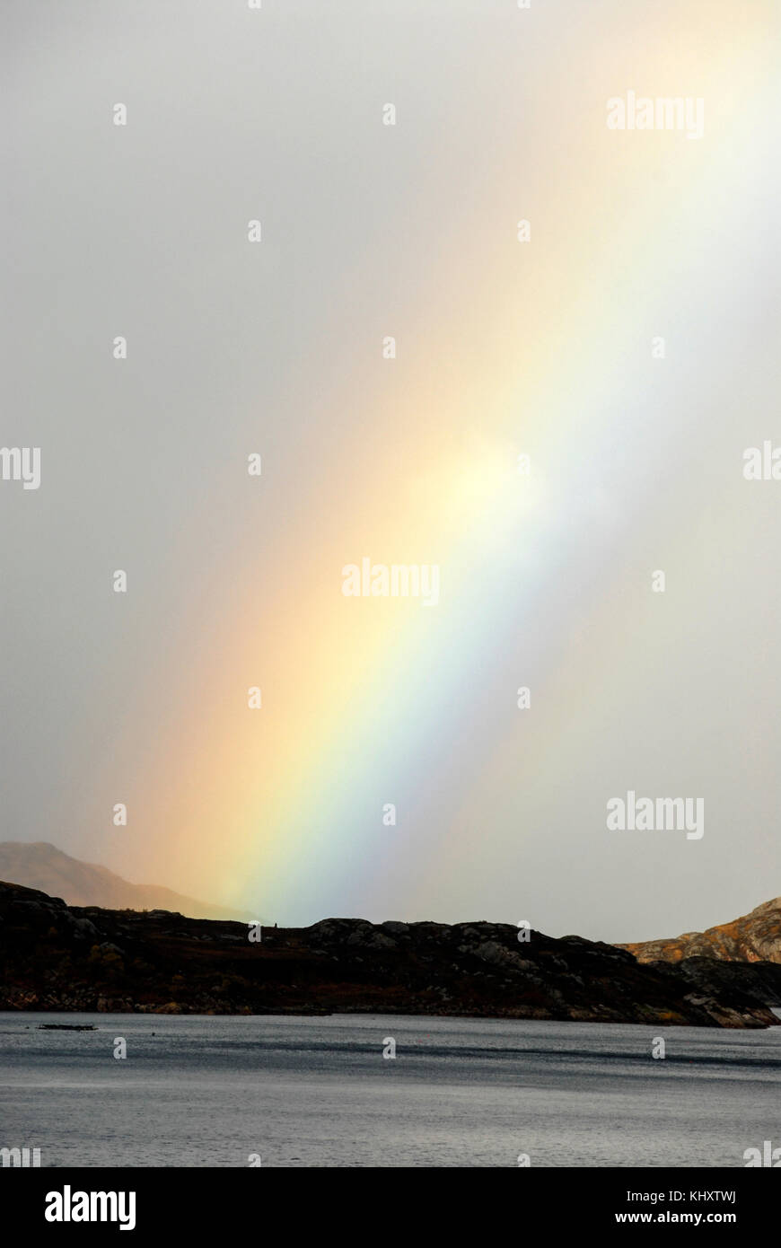 A rainbow over Loch Torridon in the highlands of northwest Scotland ...