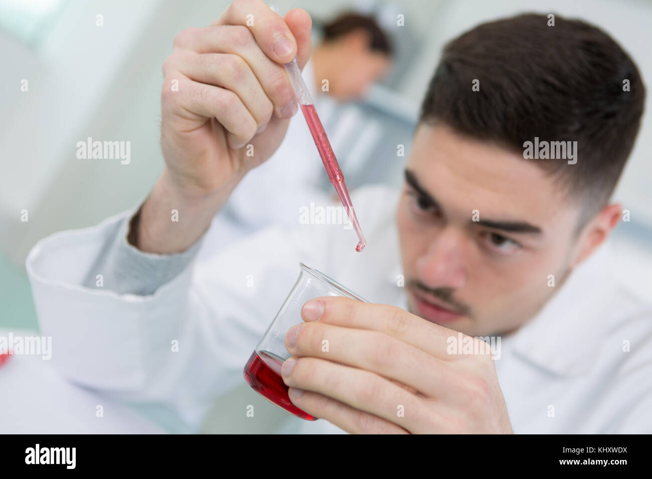 doctor dropping blood samples Stock Photo - Alamy