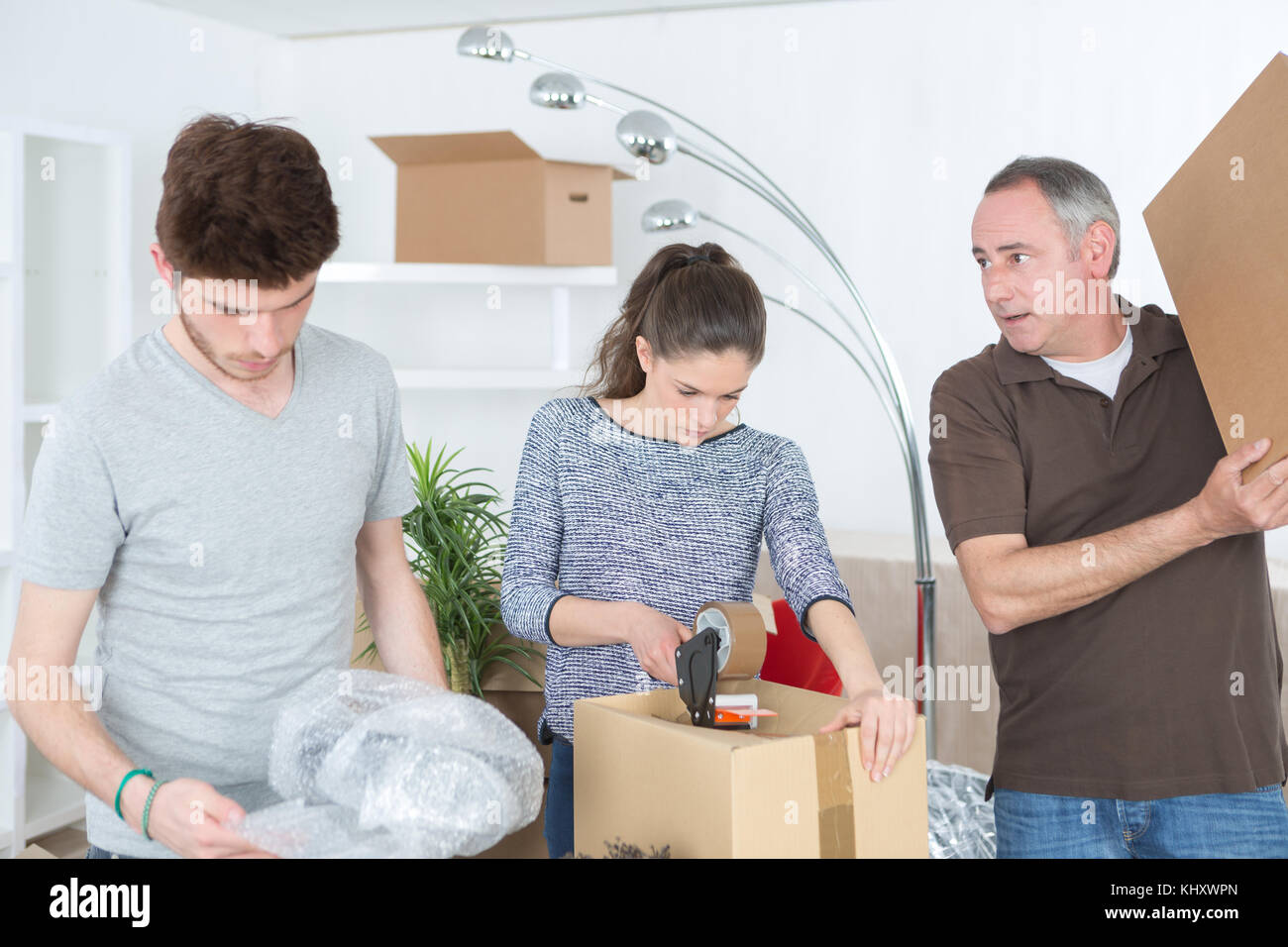family preparing to move to another house Stock Photo - Alamy