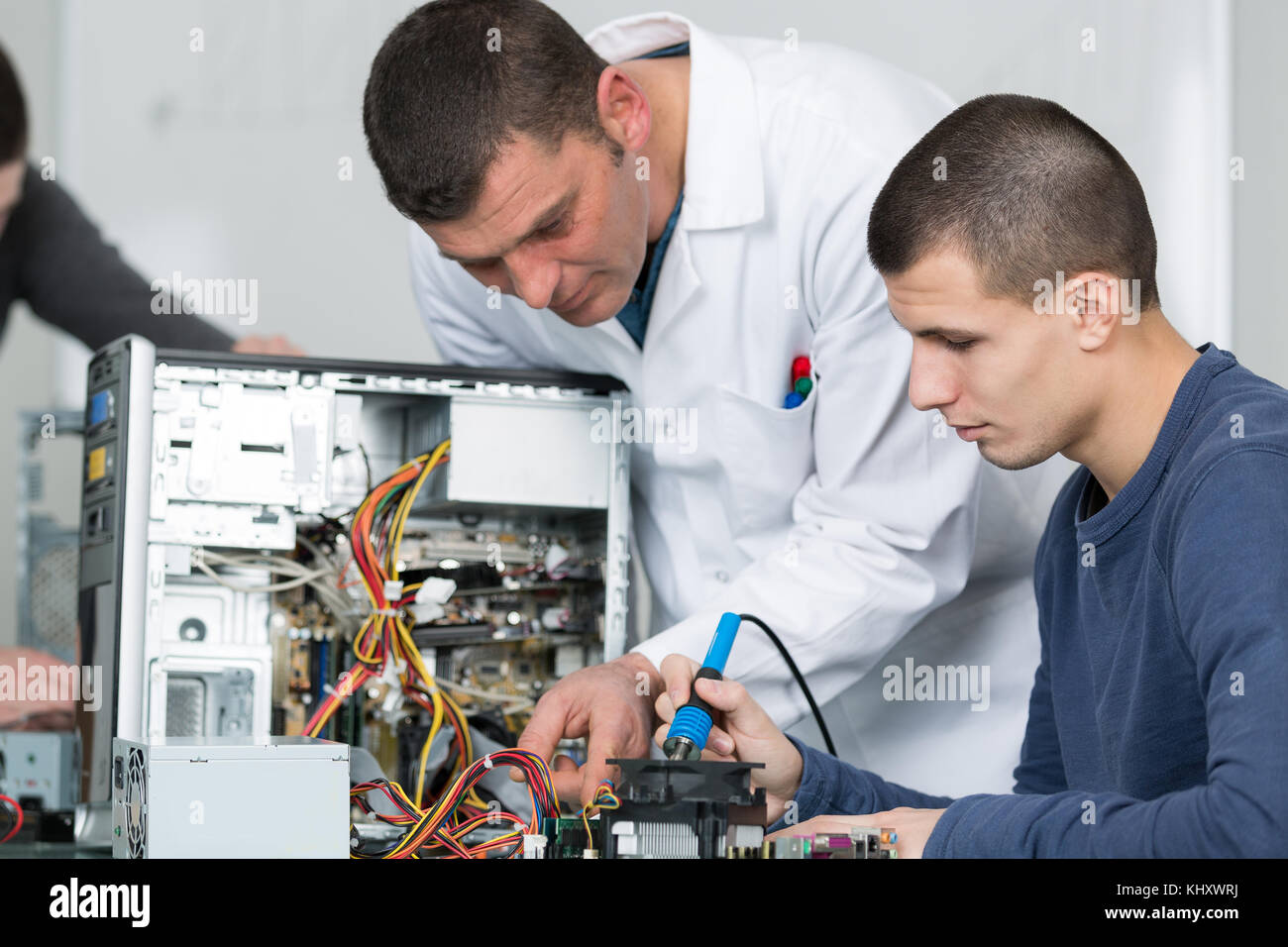 Electronics student working on computer Stock Photo - Alamy