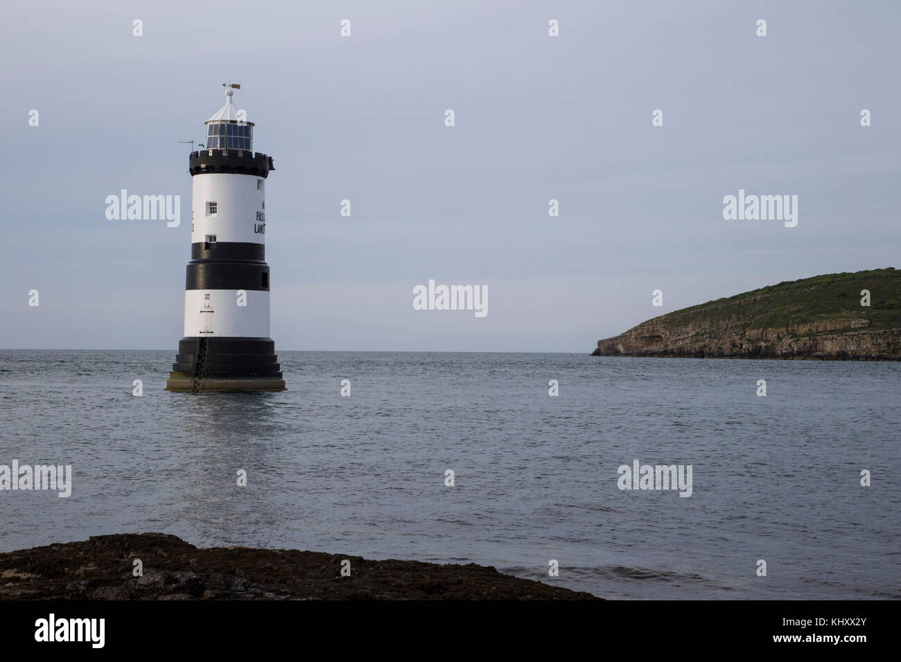 Penmon lighthouse, Trwyn Du Lighthouse between Black Point near Penmon and Ynys Seriol, or ...
