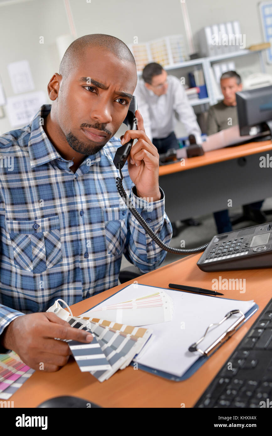 man on the phone in the office Stock Photo - Alamy