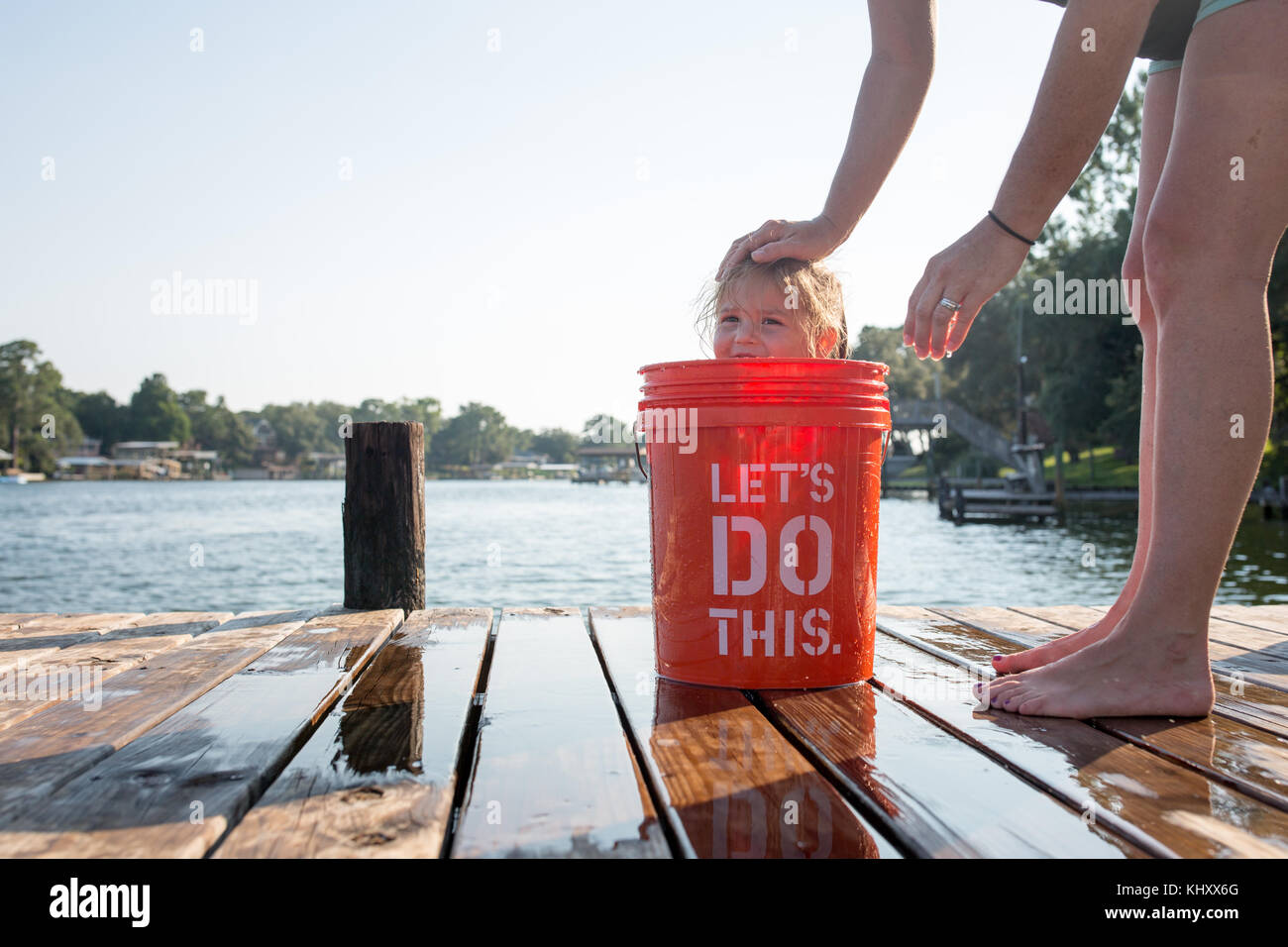 Child bucket on head hi-res stock photography and images - Alamy