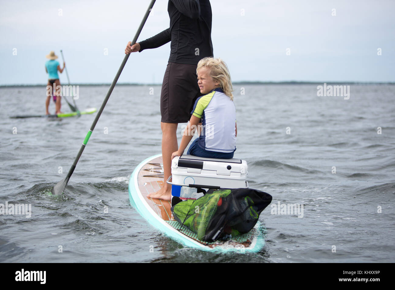 Boy girl on paddle board hi-res stock photography and images - Alamy
