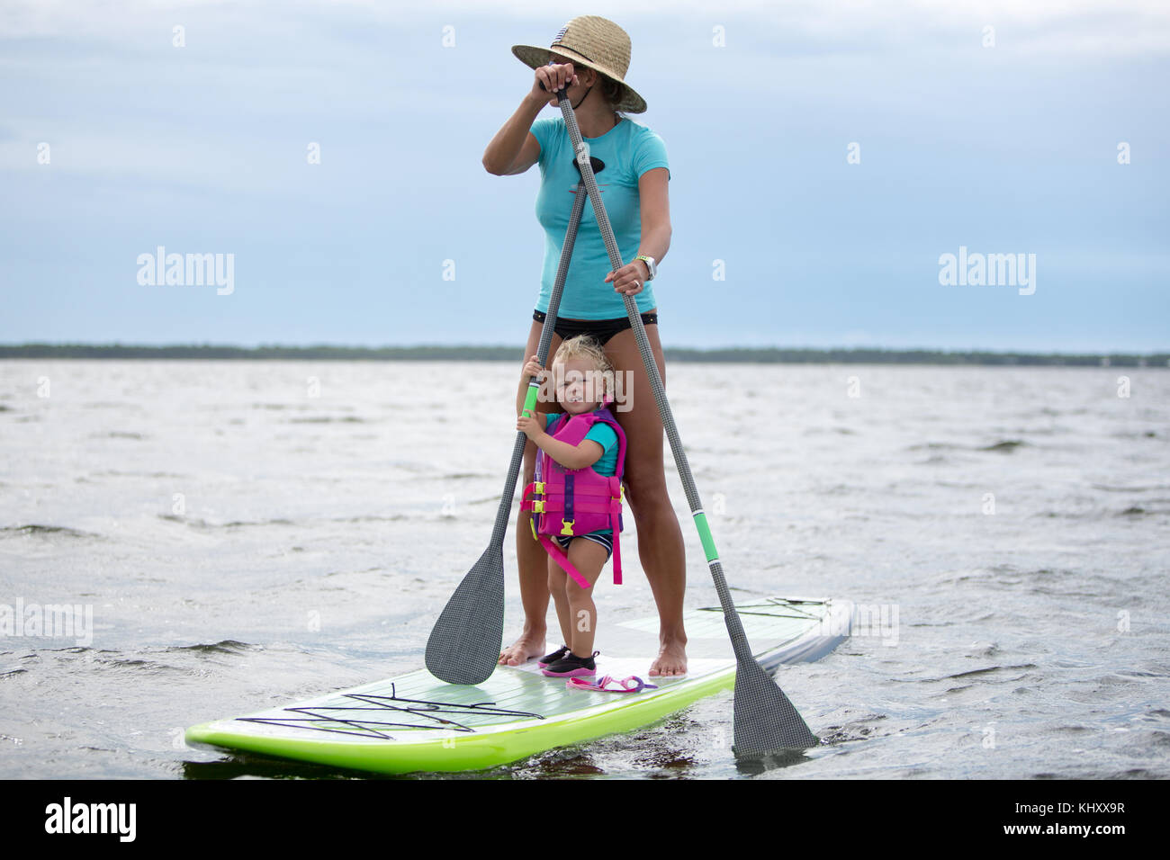 Mother and young daughter on paddle board Stock Photo - Alamy Mother and young daughter on paddle board Stock Photo - Alamy