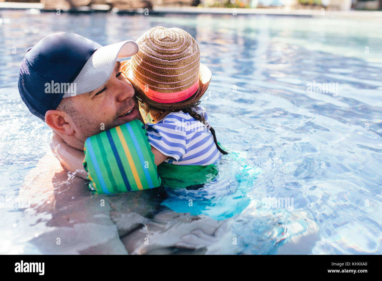 Family pool daughter enjoyment clothing hi-res stock photography and ...