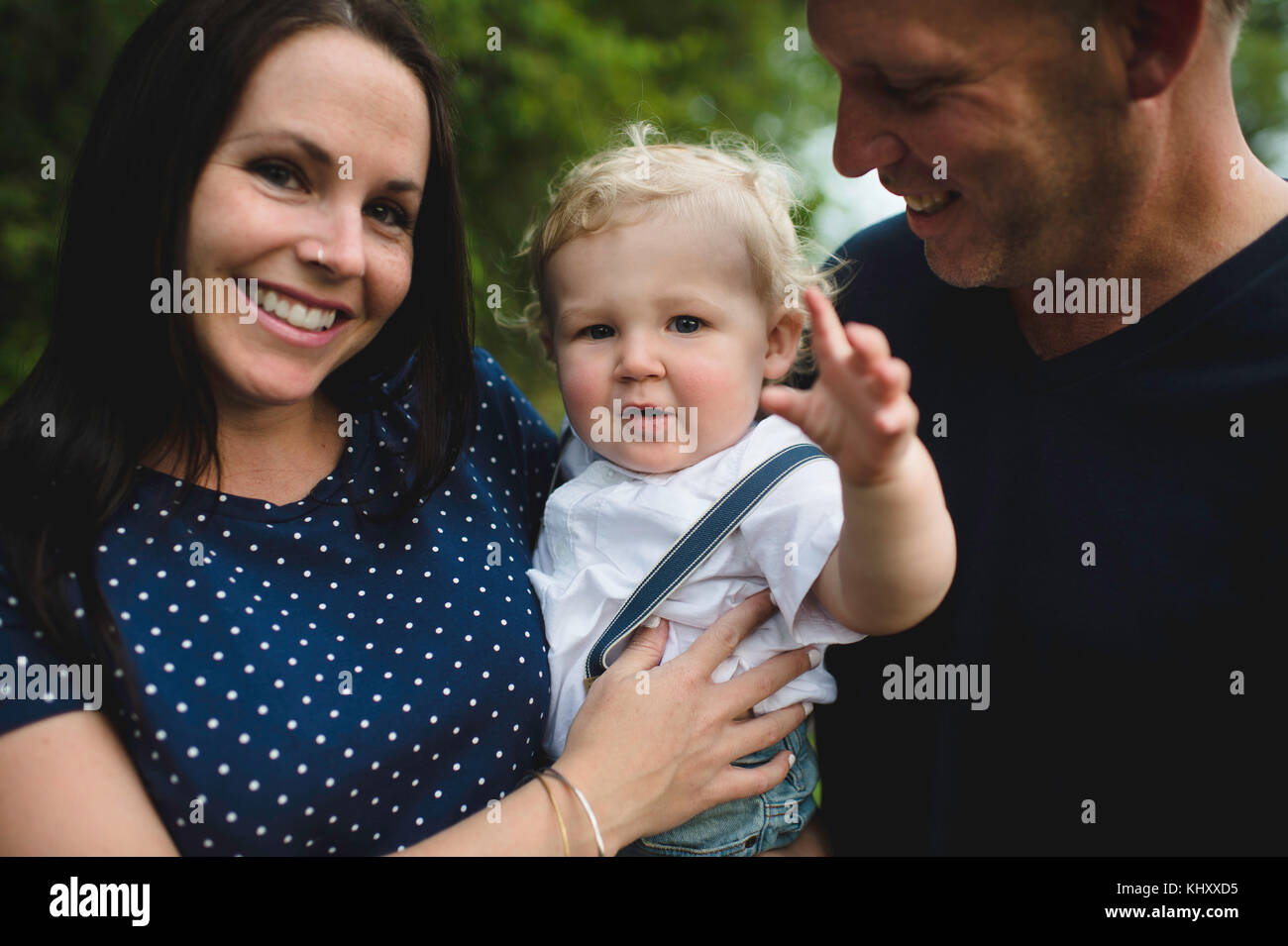 Portrait of couple and toddler son Stock Photo - Alamy