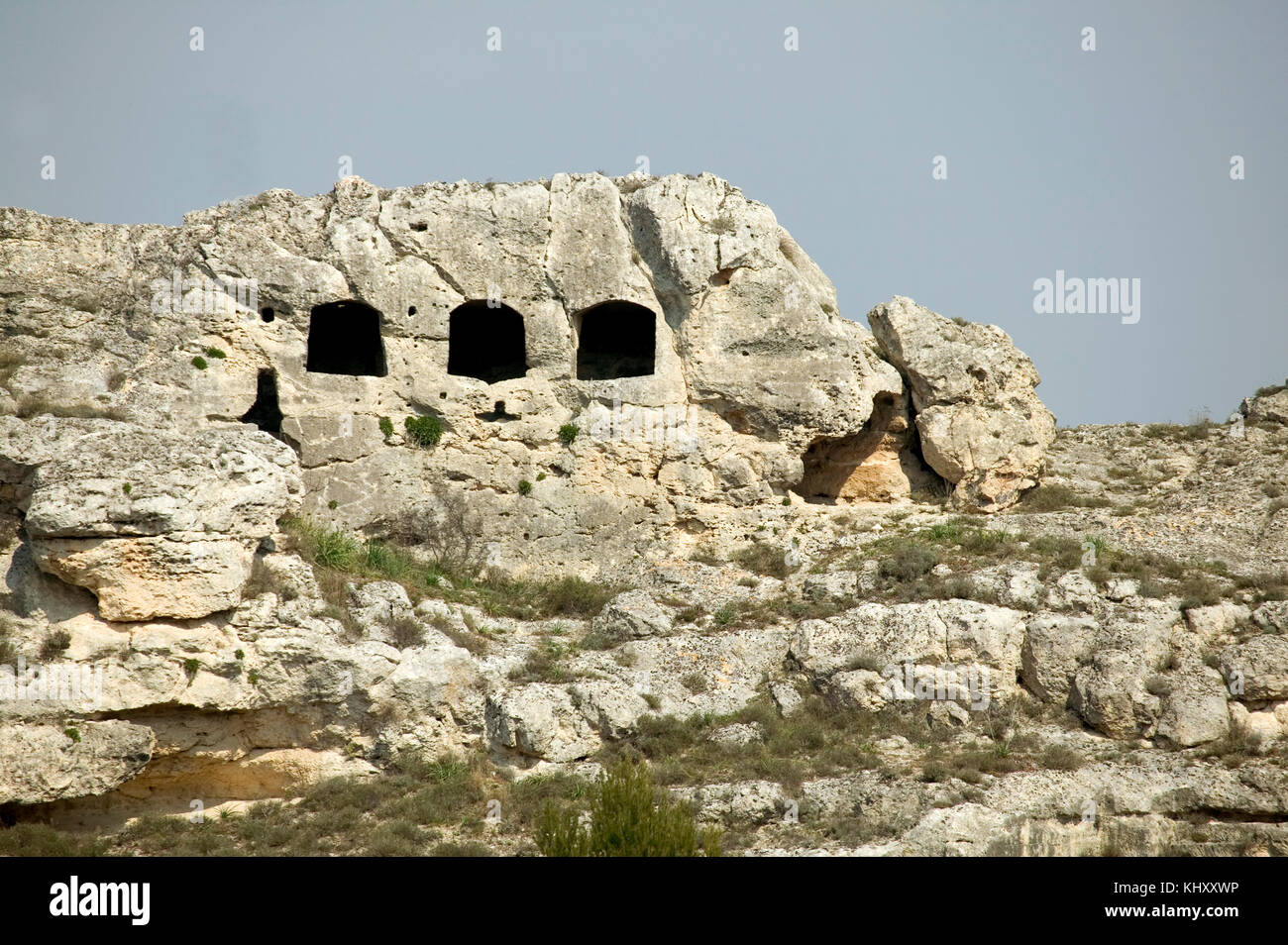 Cave house windows carved from volcanic rock at Matera, Basilicata ...