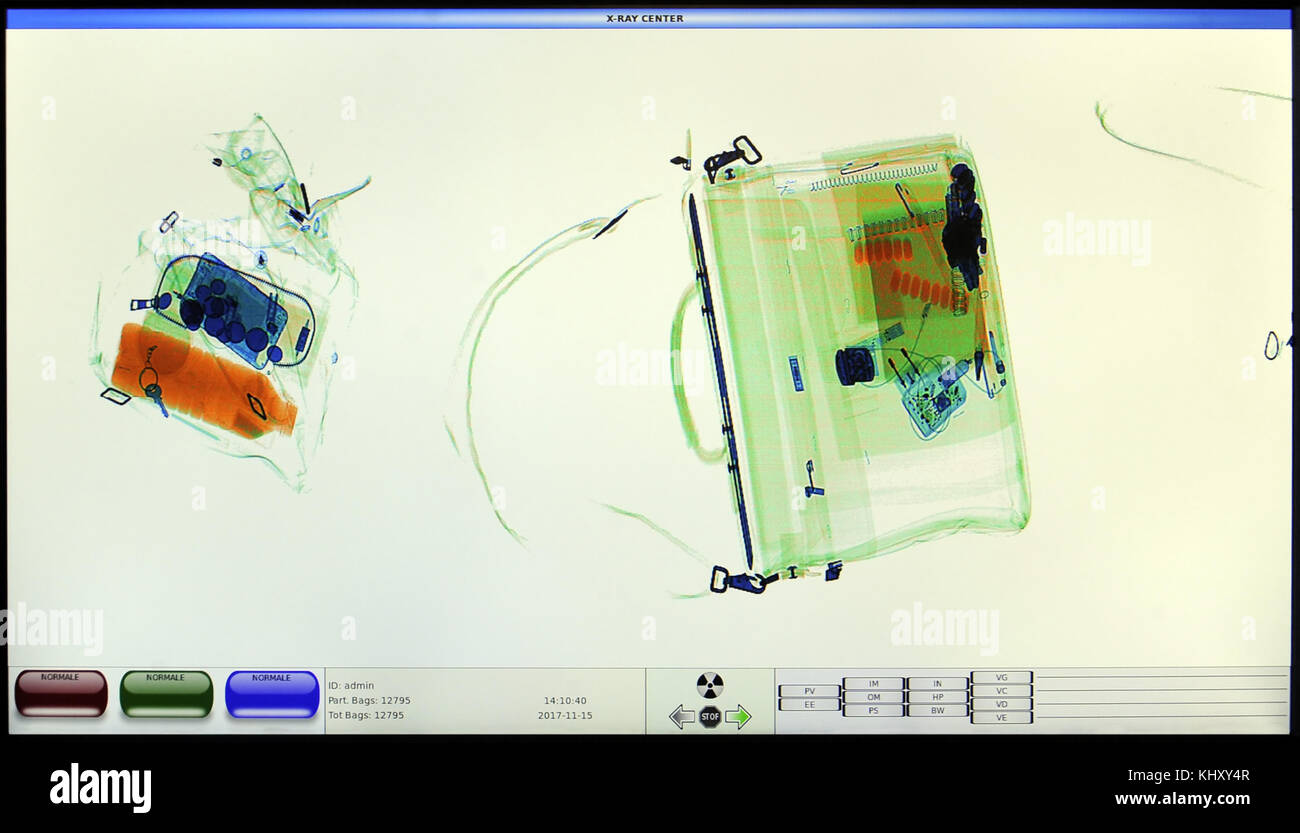 screenshot from an airport x-ray luggage security scanner Stock Photo ...