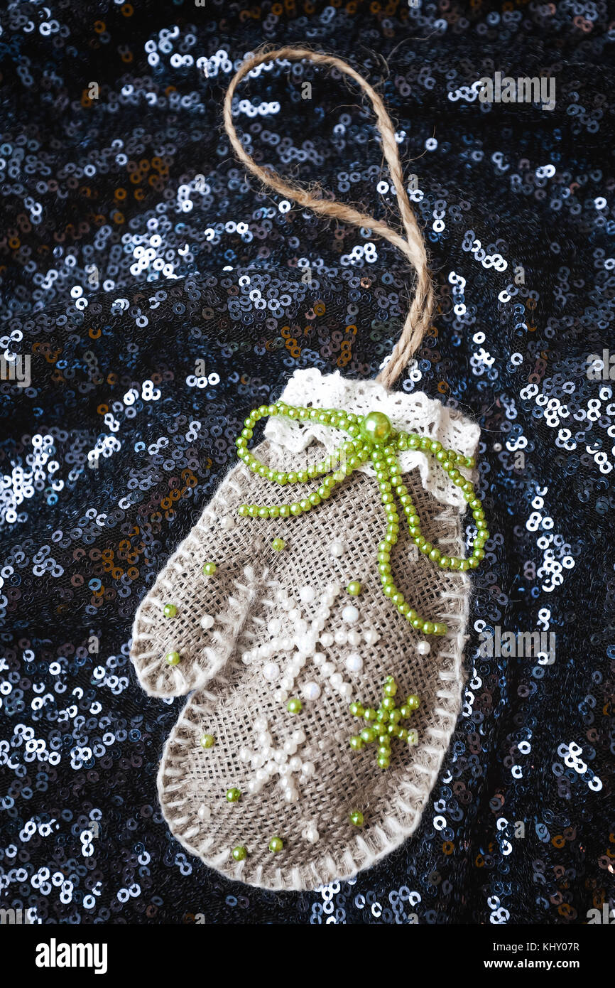 Merry Christmas and new year toy. Handmade decoration mitten Stock ...