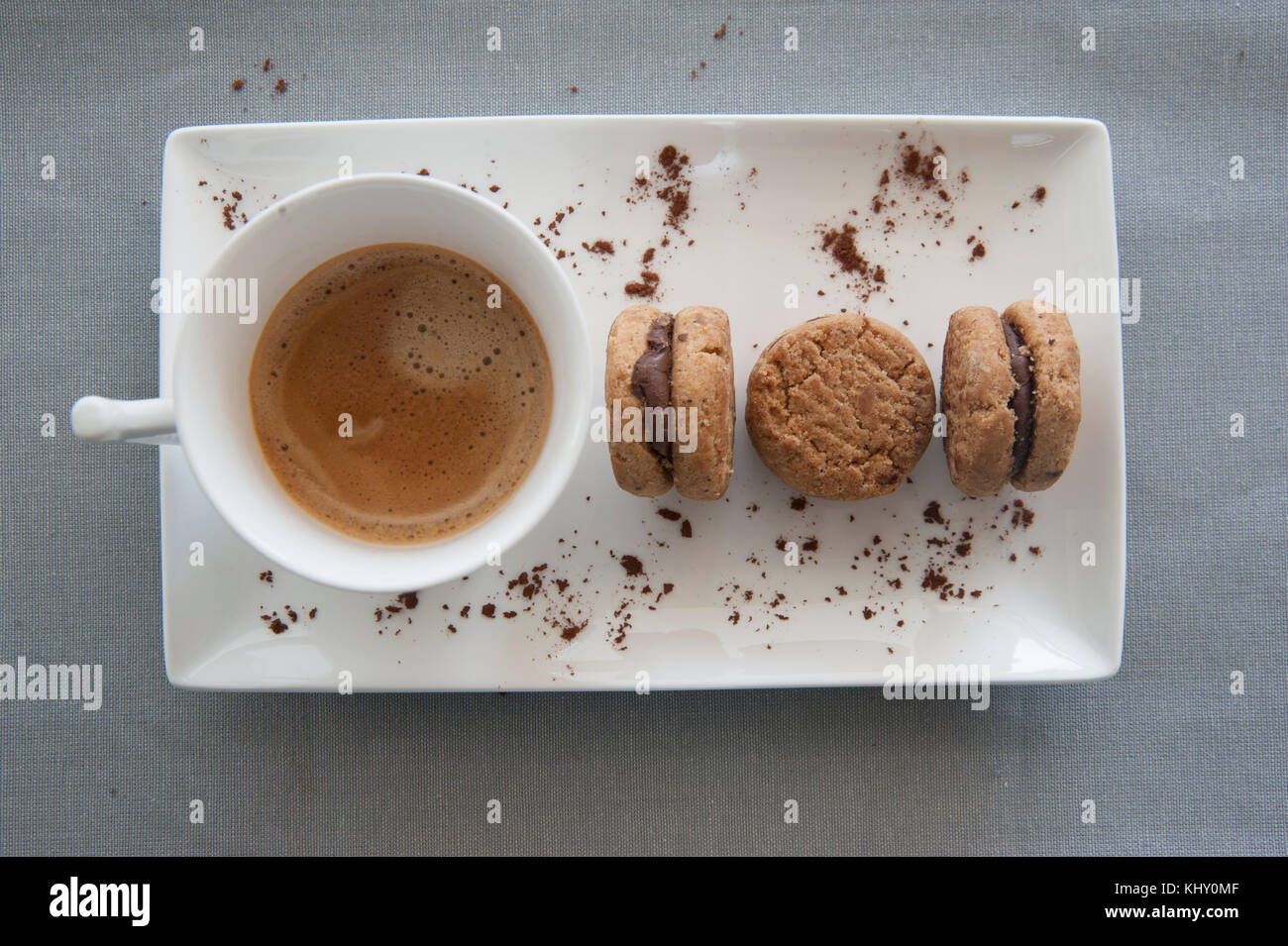 top view of ceramic cup with espresso coffee on rectangular white ...