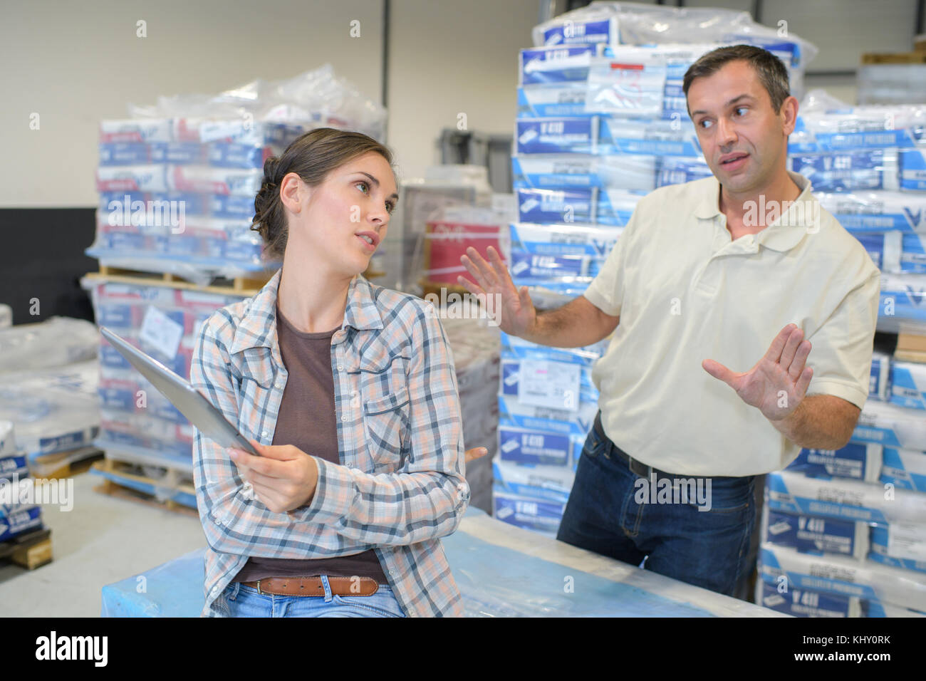 workers struggling trying to solve a logistics management problem Stock ...