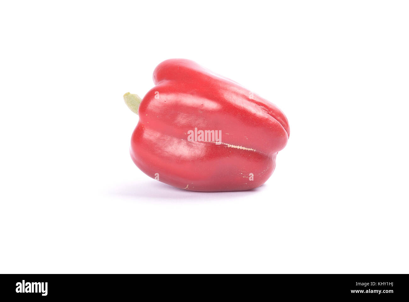 Red ball pepper on white Stock Photo - Alamy