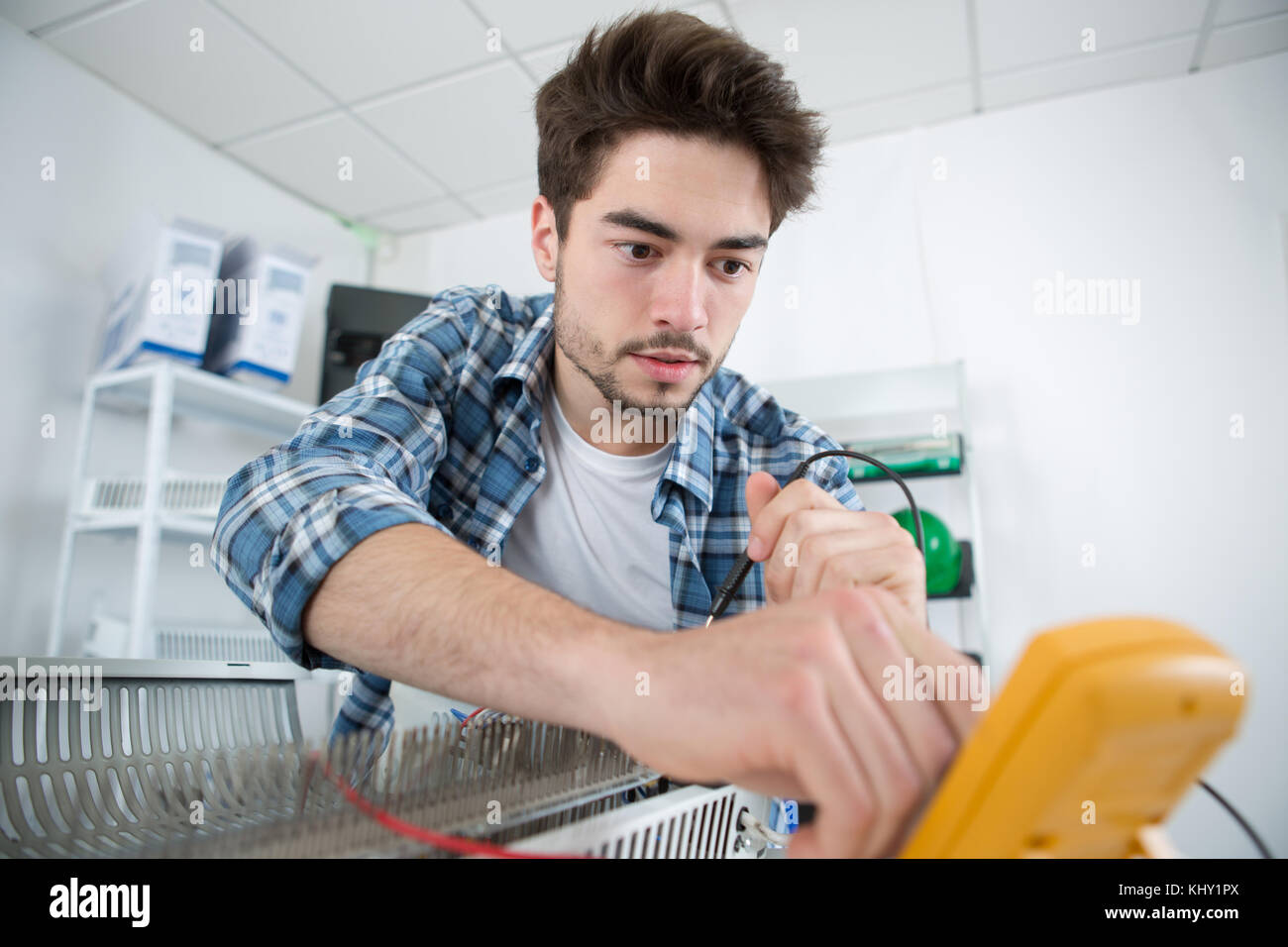 engineer measuring multimeter panel board Stock Photo - Alamy