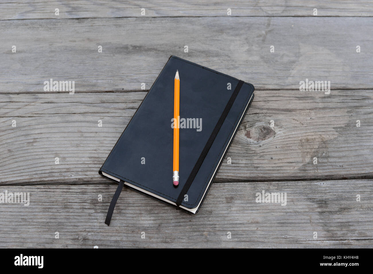 black journal on the table Stock Photo - Alamy