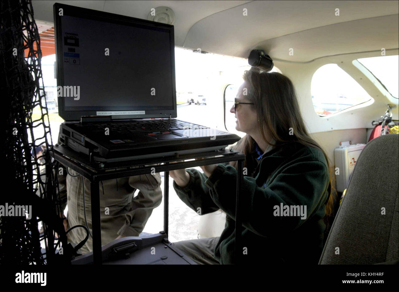 Computer on rear seat in vehicle Stock Photo - Alamy