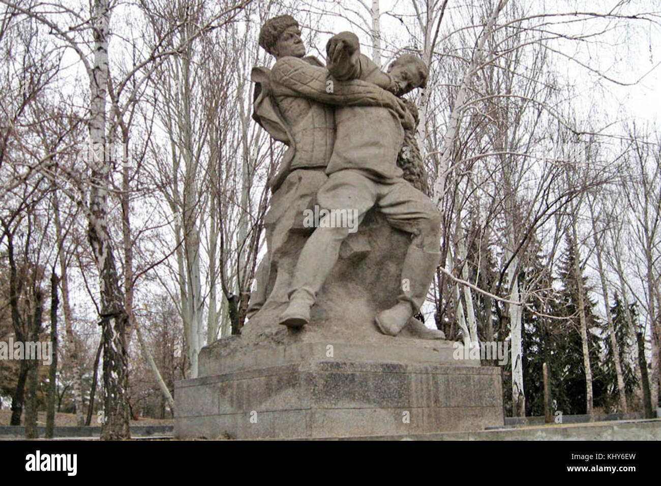 Sculpture of soldier, who support the wounded commander 001 Stock Photo ...