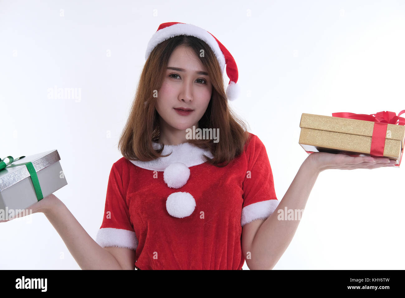 portrait of asian woman in santa claus dress on white background. girl ...