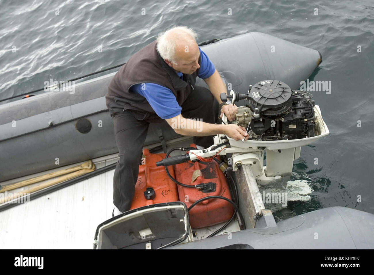 Engineer person working on boat engine Stock Photo - Alamy