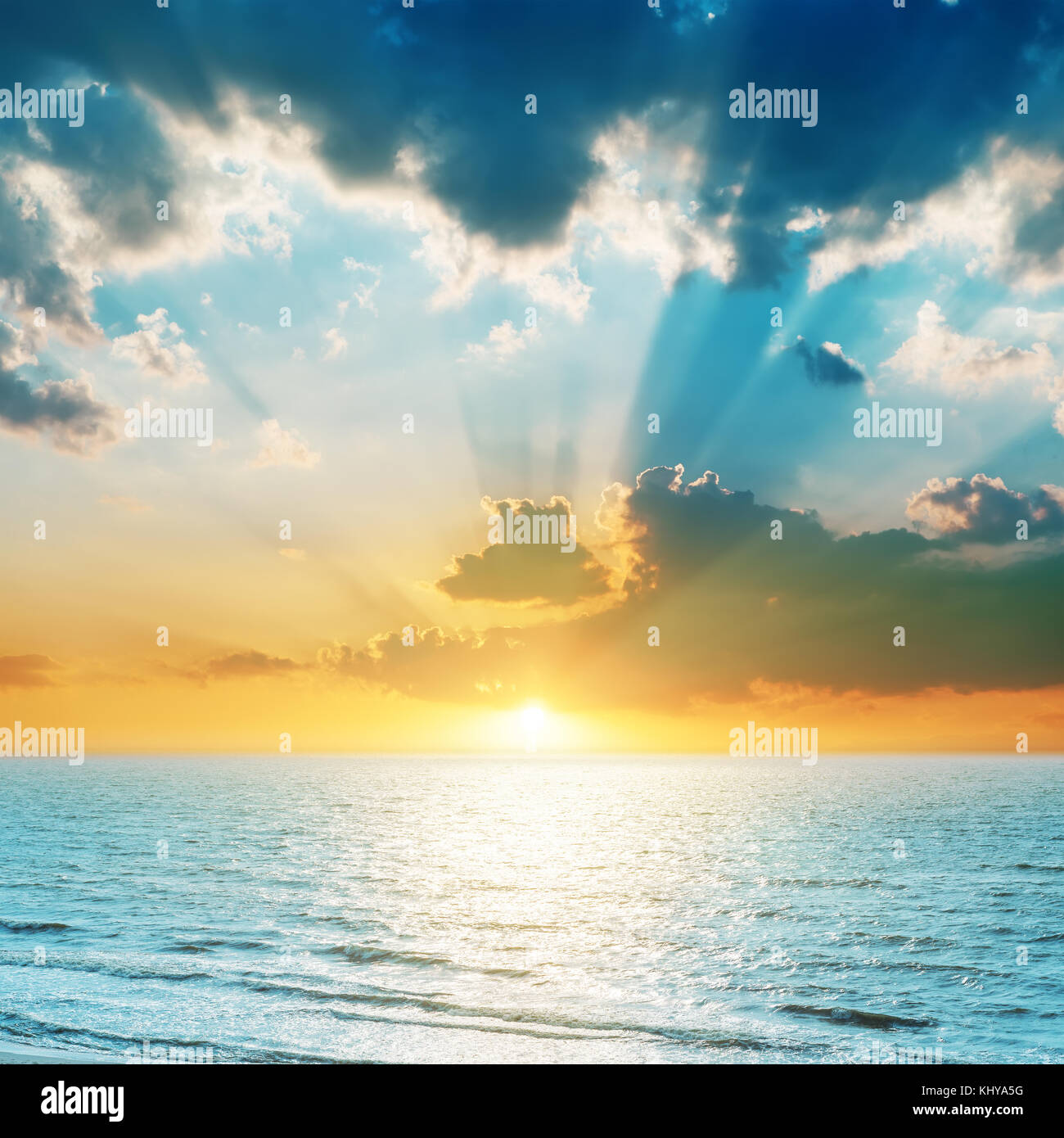 perfect sunset and sea with reflections Stock Photo - Alamy
