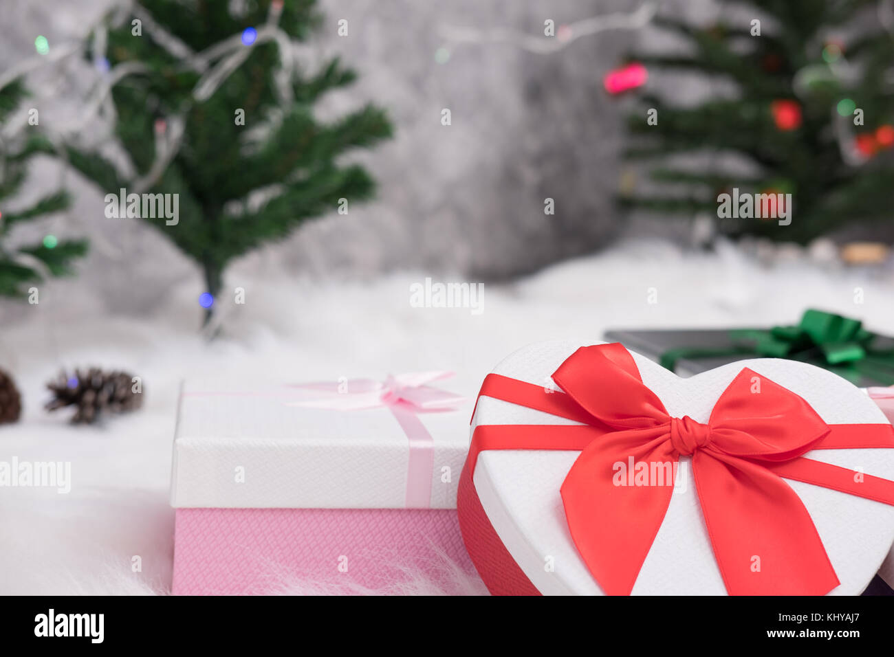 present boxes and decorated christmas tree. gift box for xmas party ...