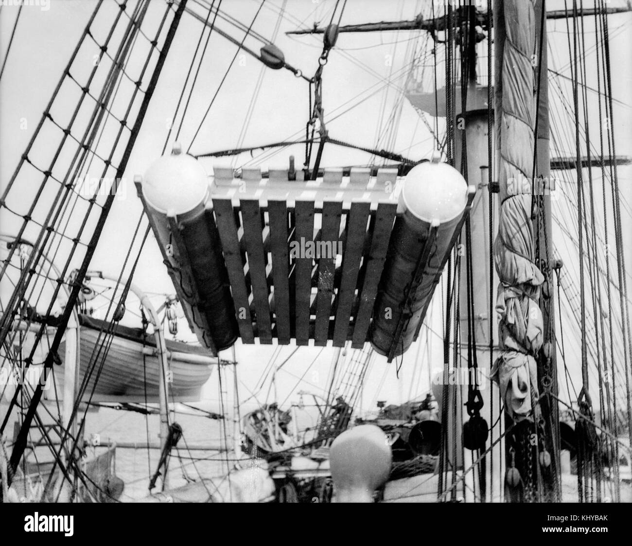 The life raft from 'Elingamite' being hoisted off the upper deck of HMS ...