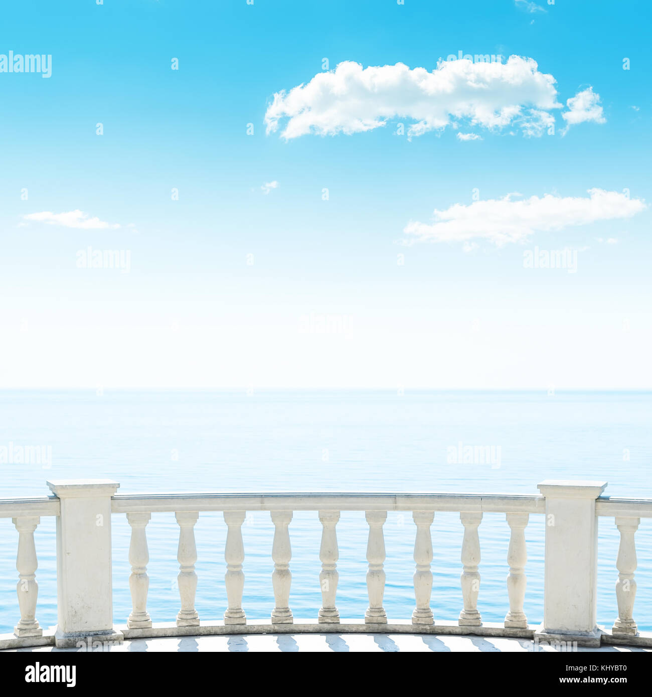 balcony over sea and white clouds in blue sky Stock Photo - Alamy