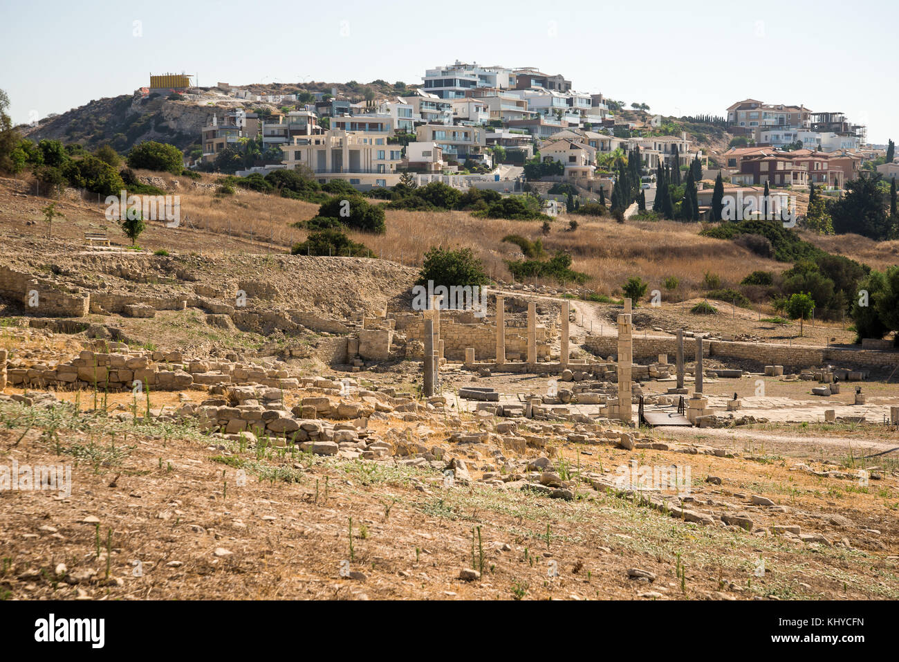 Ruins of Amathus ancient city with modern residential houses in ...