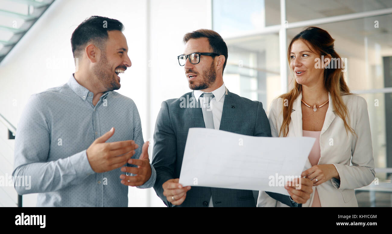 Group of business people collaborating in office Stock Photo - Alamy