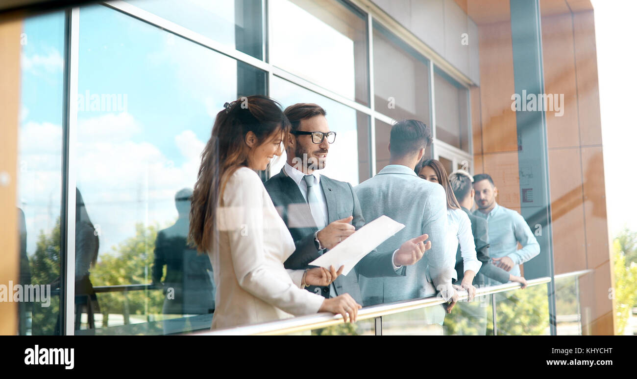 Business people talking outdoor Stock Photo - Alamy