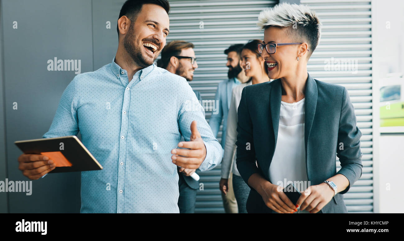 Successful company with happy workers Stock Photo - Alamy
