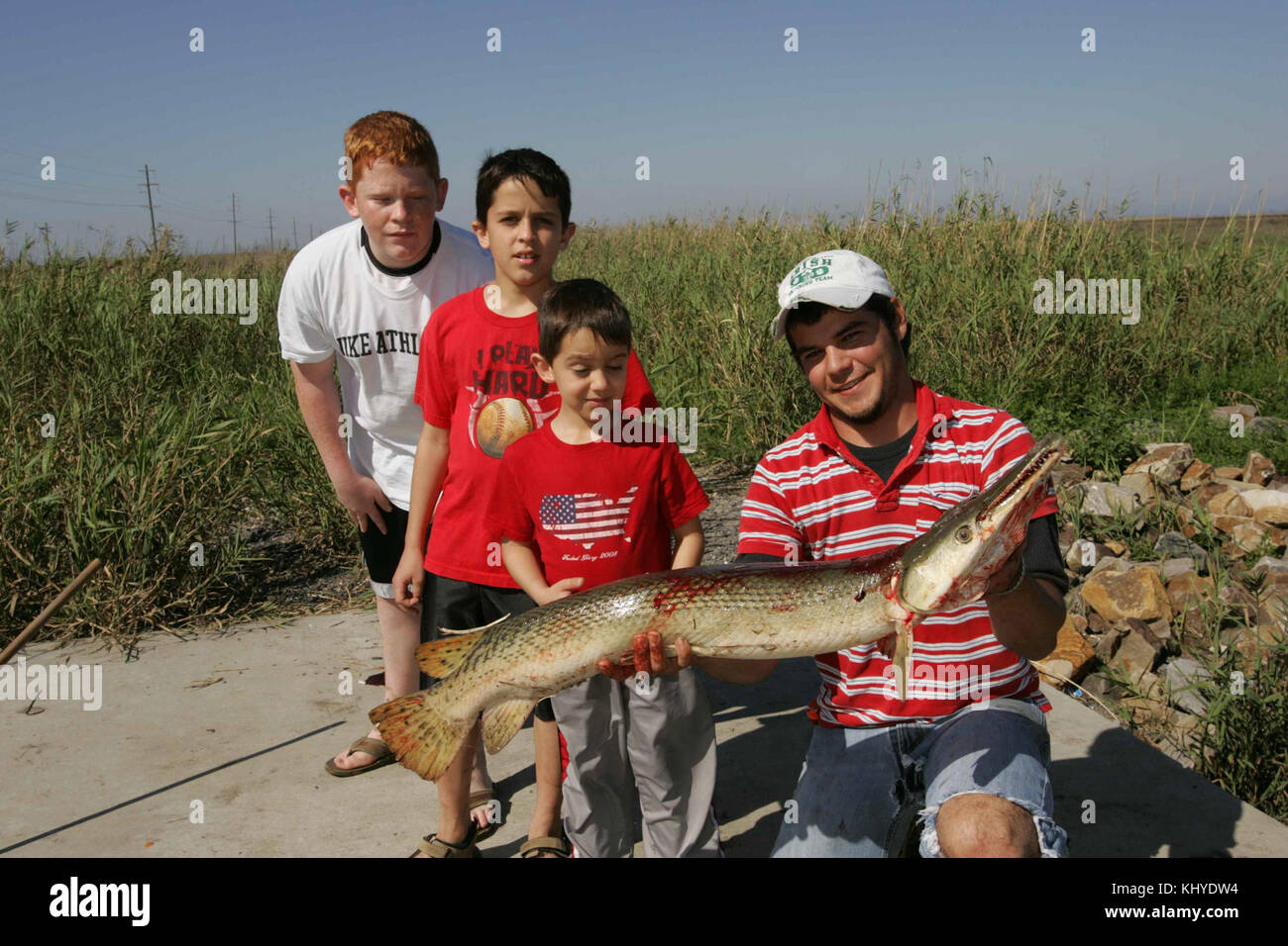 Children with fish hi-res stock photography and images - Alamy