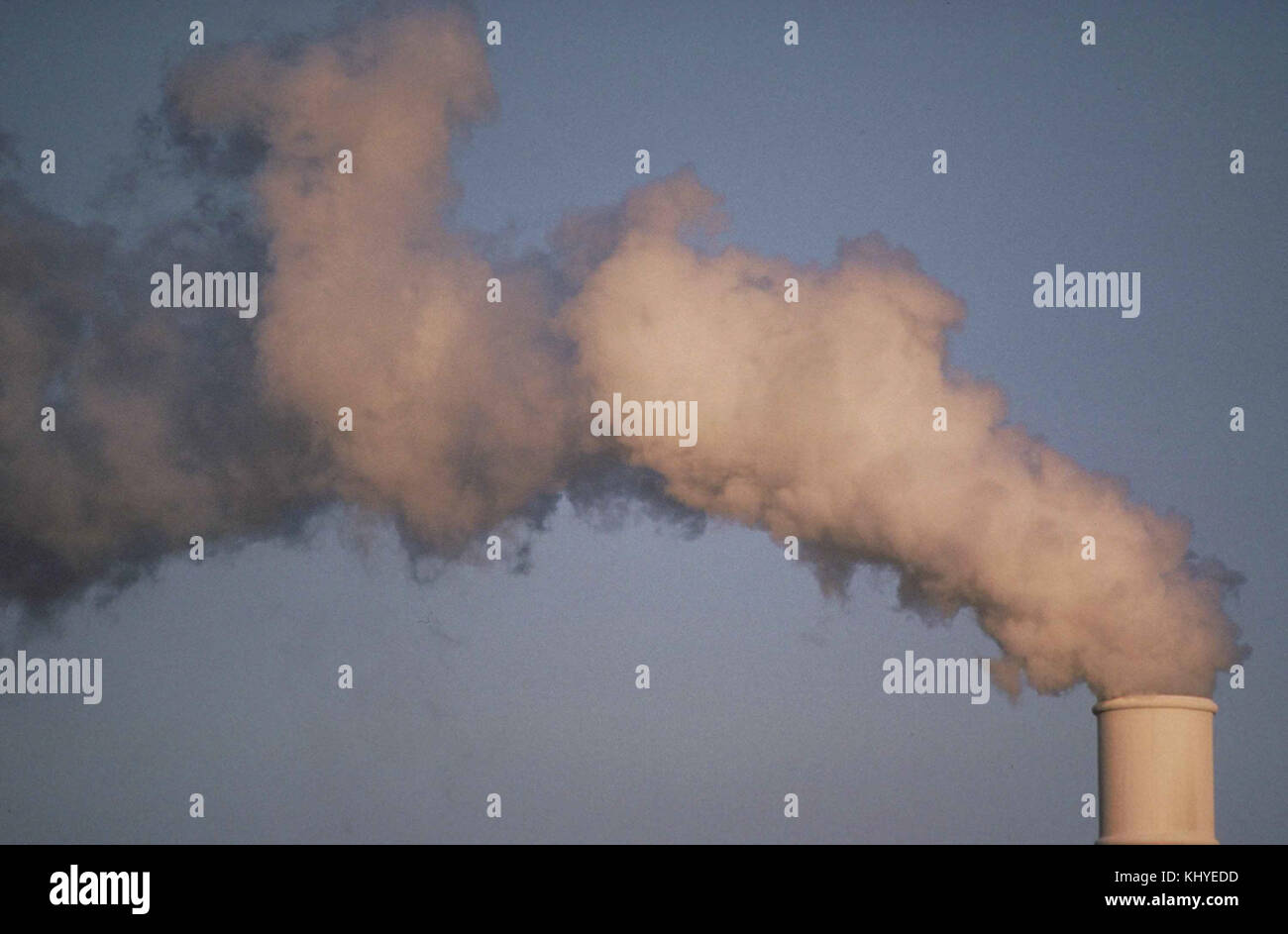 Air pollution smoke rising from plant tower Stock Photo - Alamy