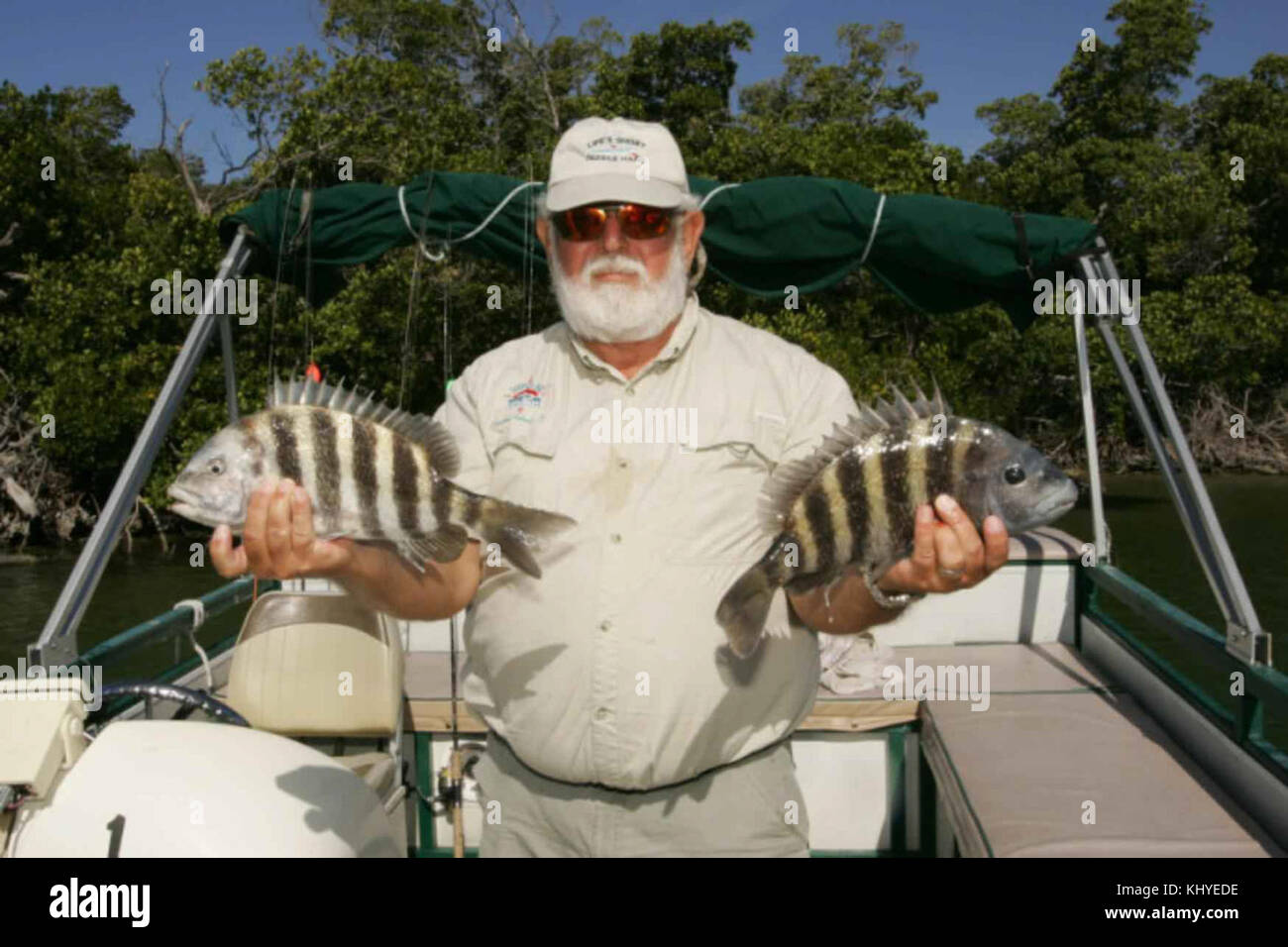 Fisherman shows catch in hi-res stock photography and images - Alamy