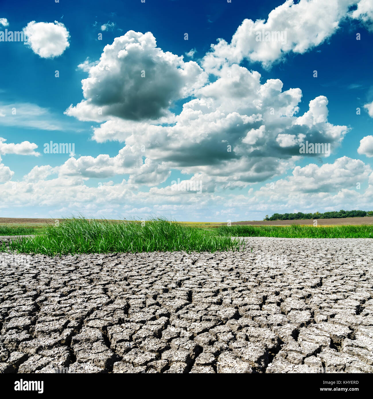 drought earth with green grass area under low dramatic clouds Stock ... drought earth with green grass area under low dramatic clouds Stock ...