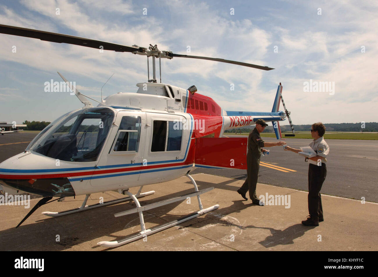 Flight crew ready for helicopter flight Stock Photo - Alamy