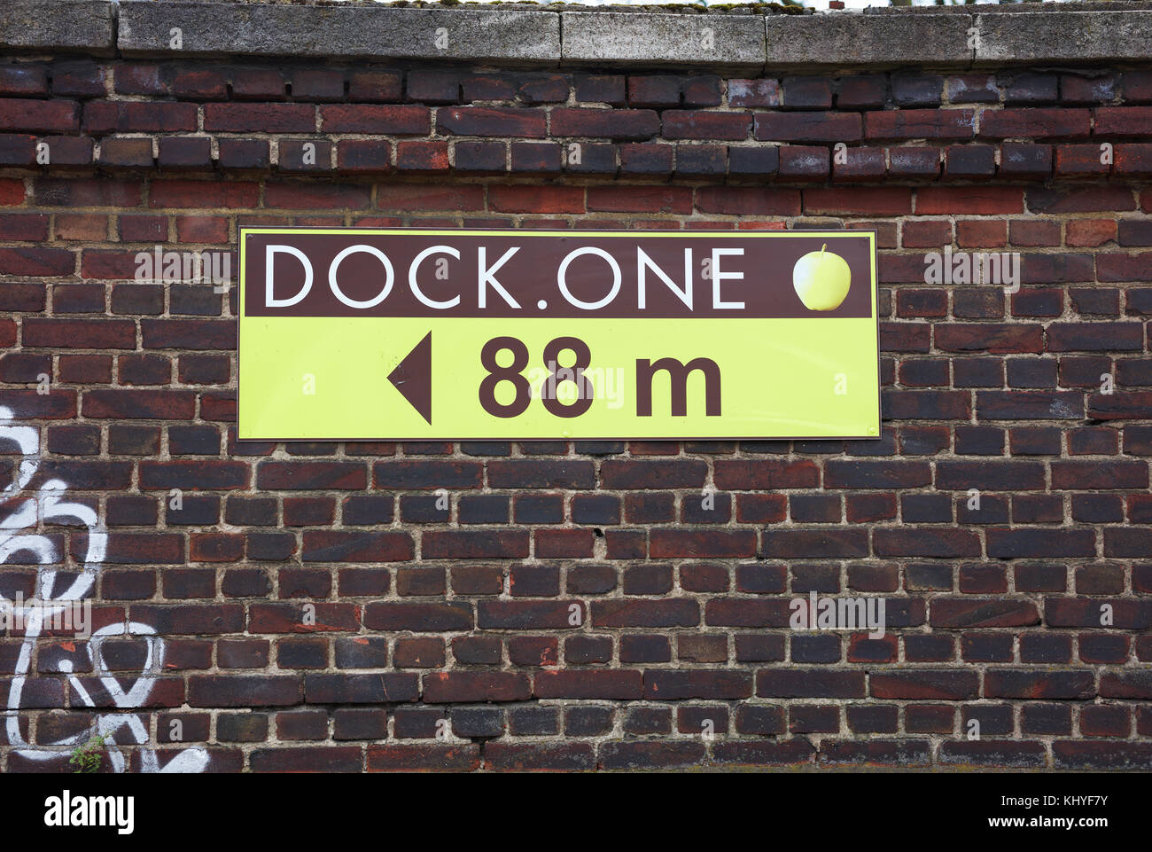 sign on brick wall Stock Photo - Alamy