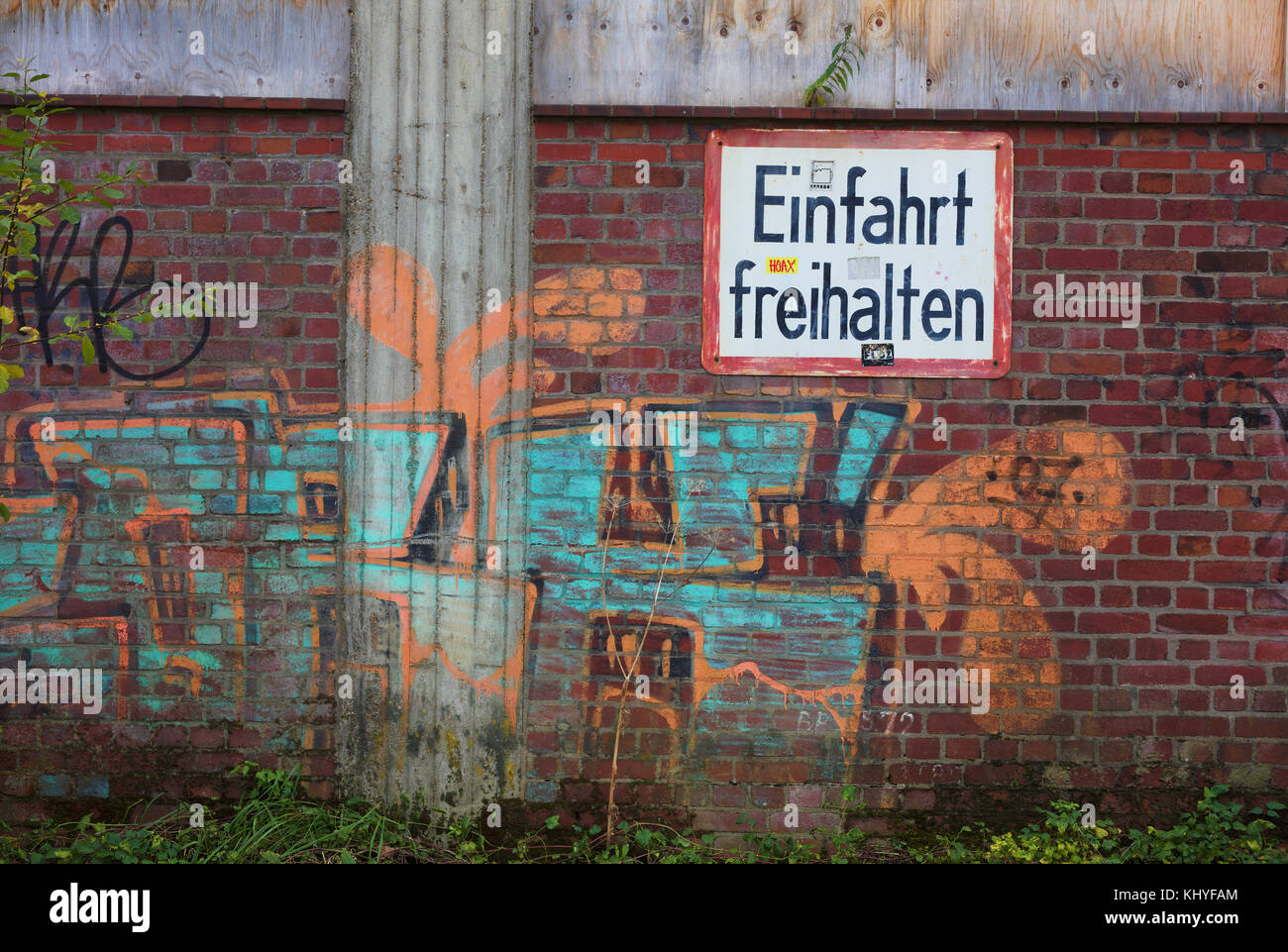 sign on brick wall Stock Photo - Alamy