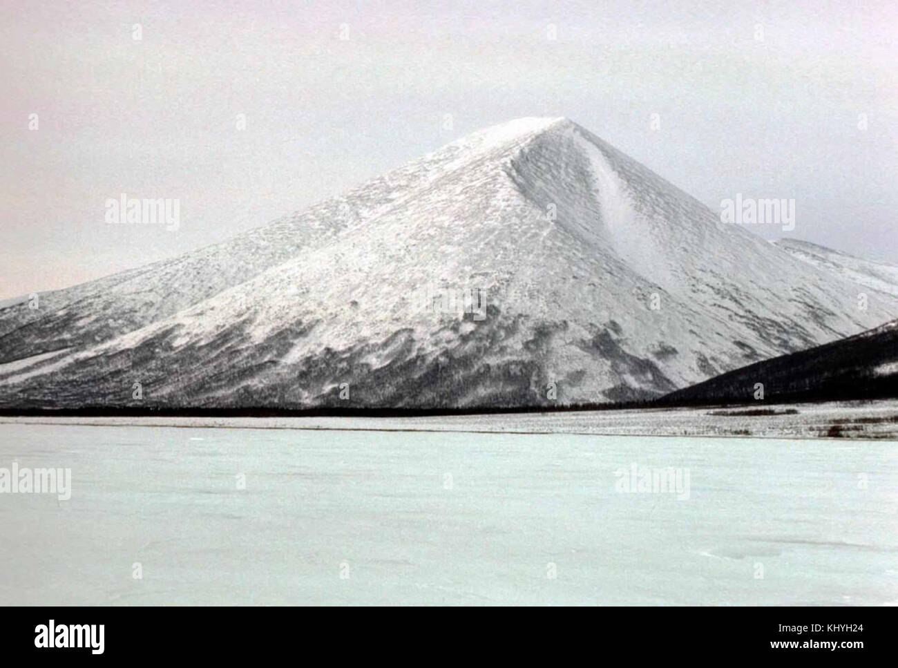 Frozen lake with mountain Stock Photo - Alamy
