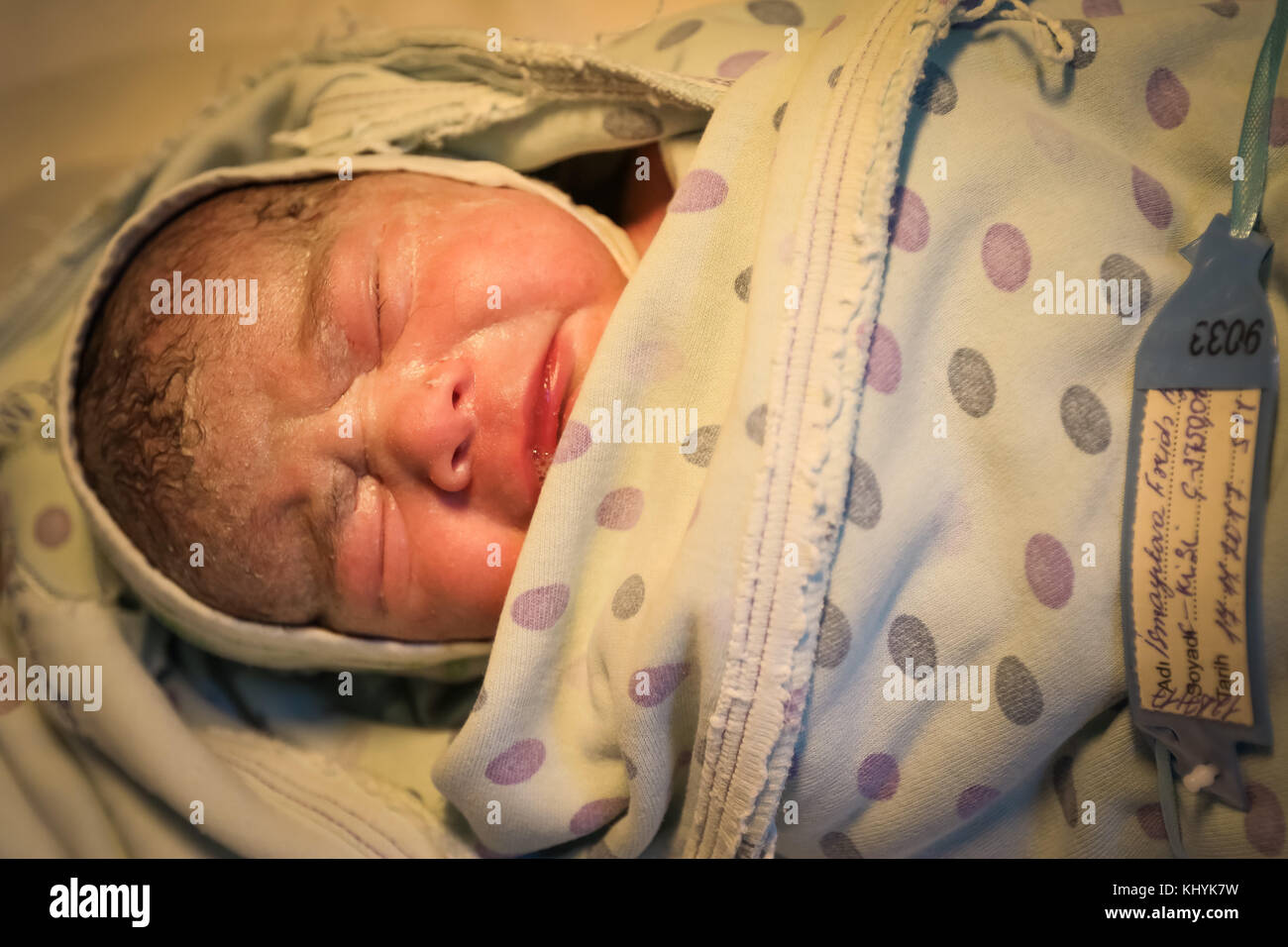 Doctor checks a newborn baby boy's joints Stock Photo - Alamy