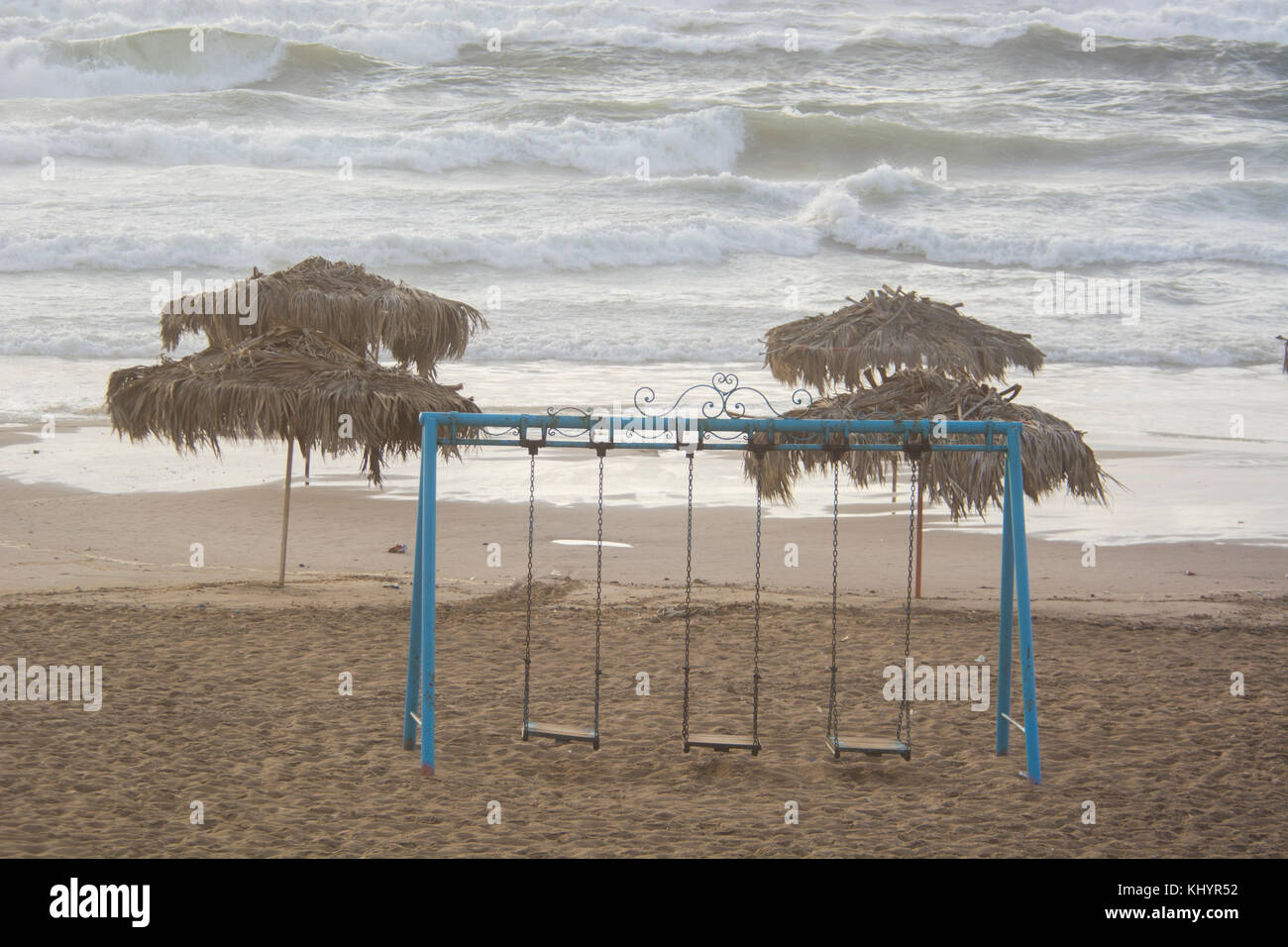Empty swings on beach hi-res stock photography and images - Alamy