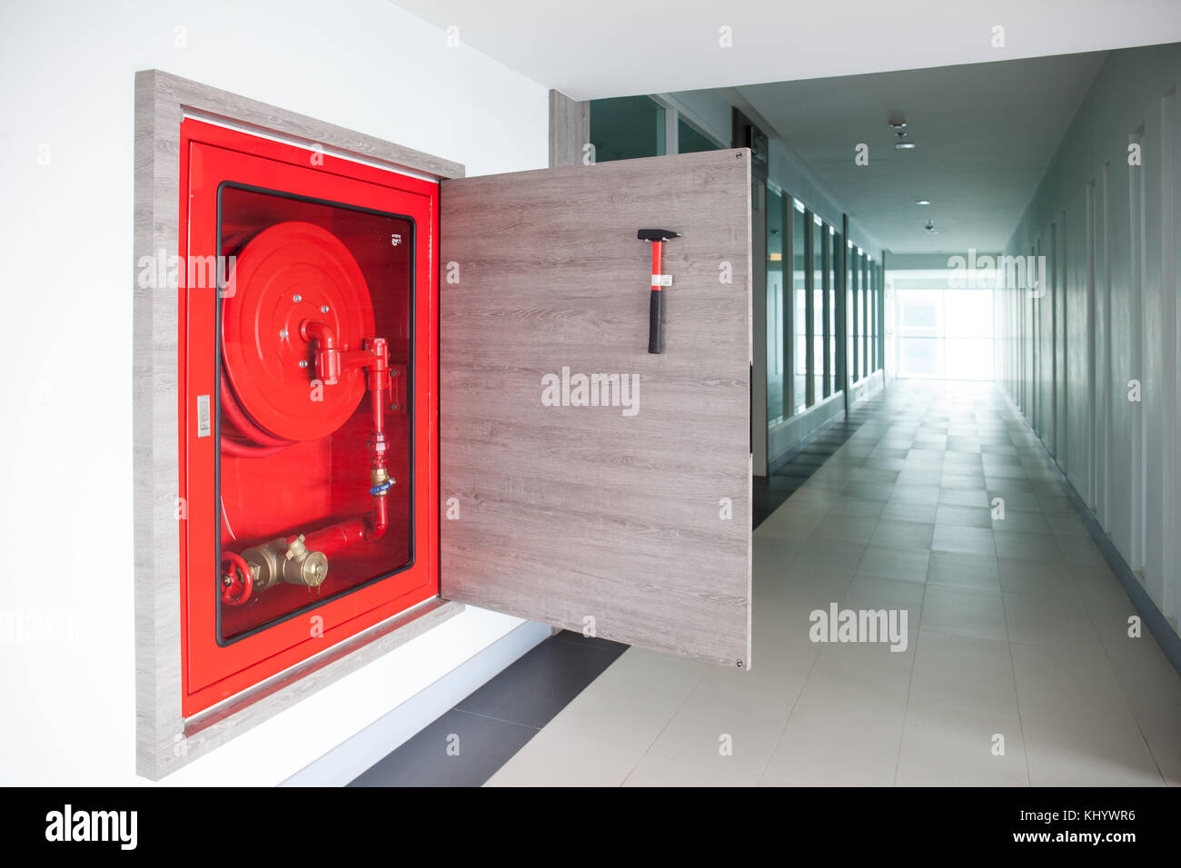 Fire equipment in box, walkway area Stock Photo - Alamy