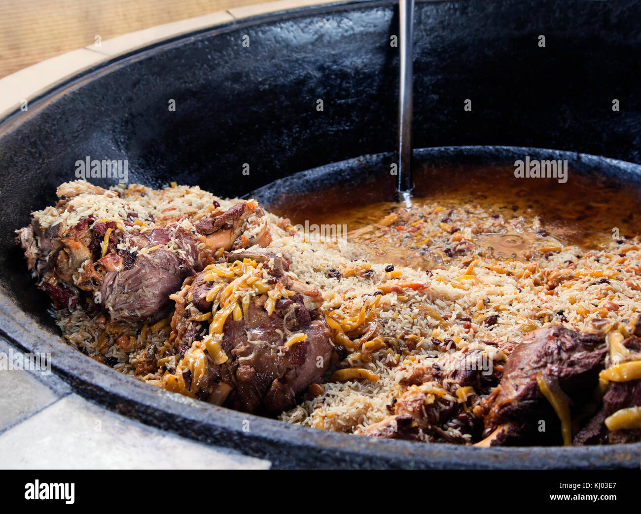 Pilaf cauldron, close-up Stock Photo - Alamy