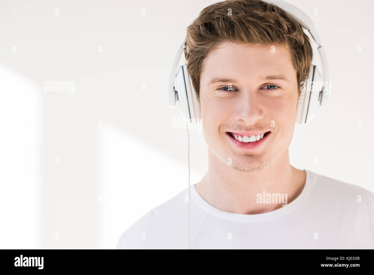 young man in headphones Stock Photo - Alamy