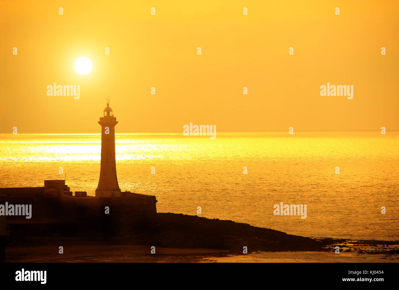 Lighthouse "Phare de Rabat" on sunset background, Kasbah of the Udayas ...