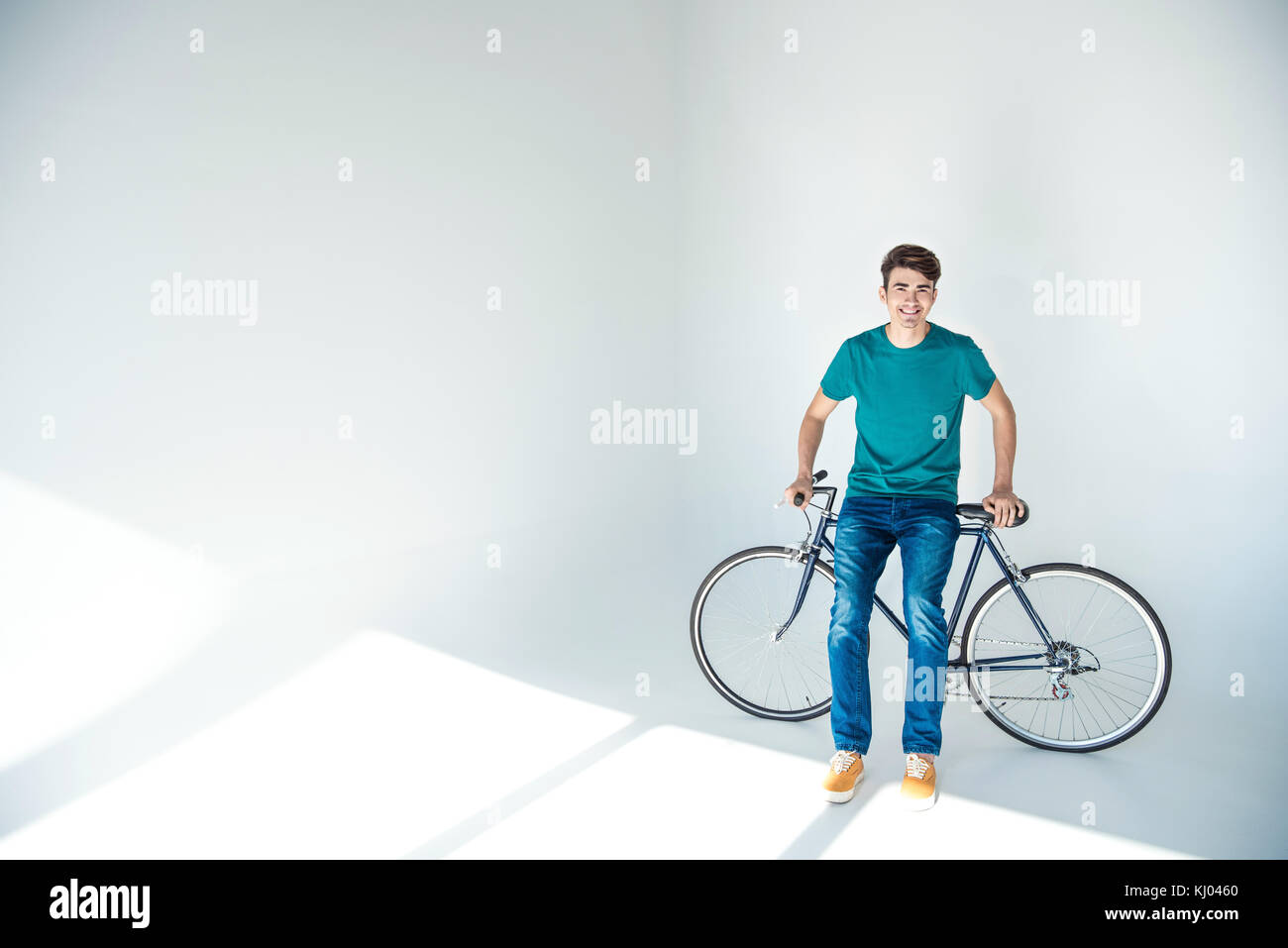 Man cheerful smile ride bicycle hi-res stock photography and images - Alamy