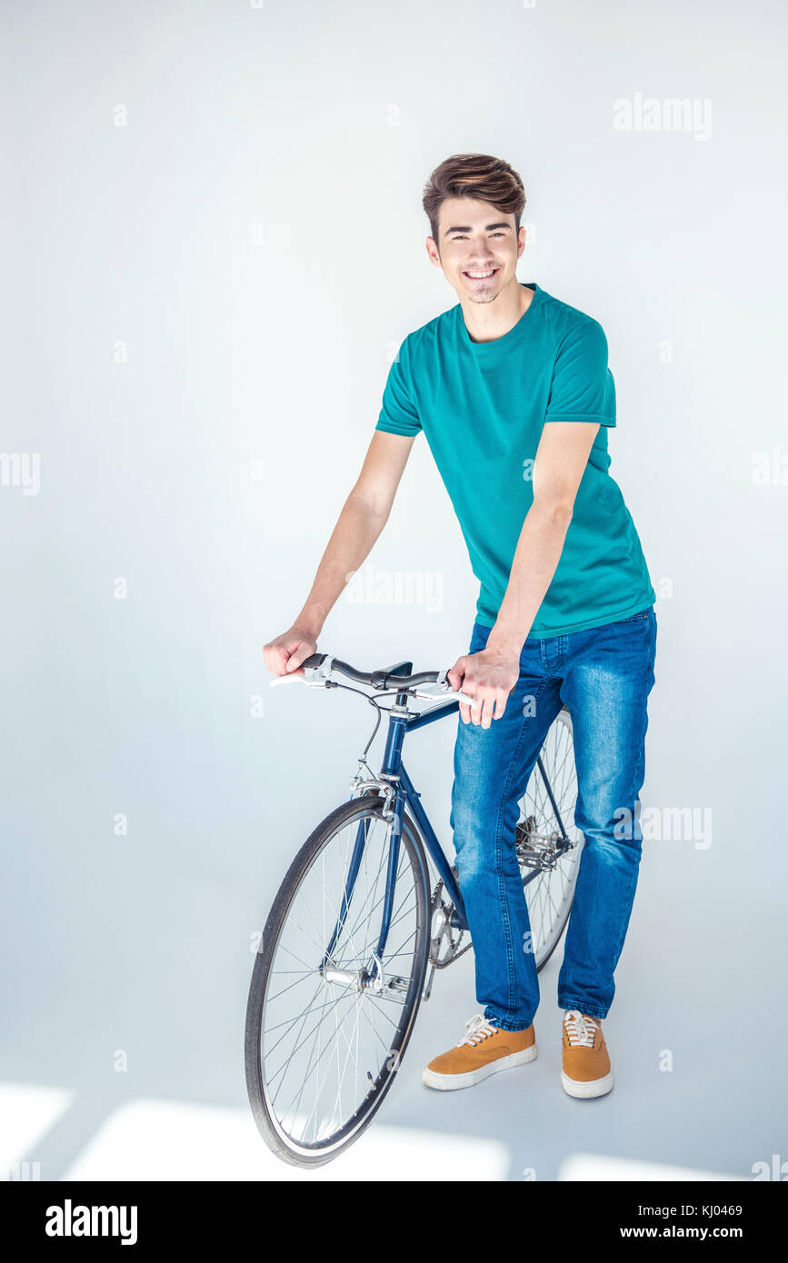 Man cheerful smile ride bicycle hi-res stock photography and images - Alamy