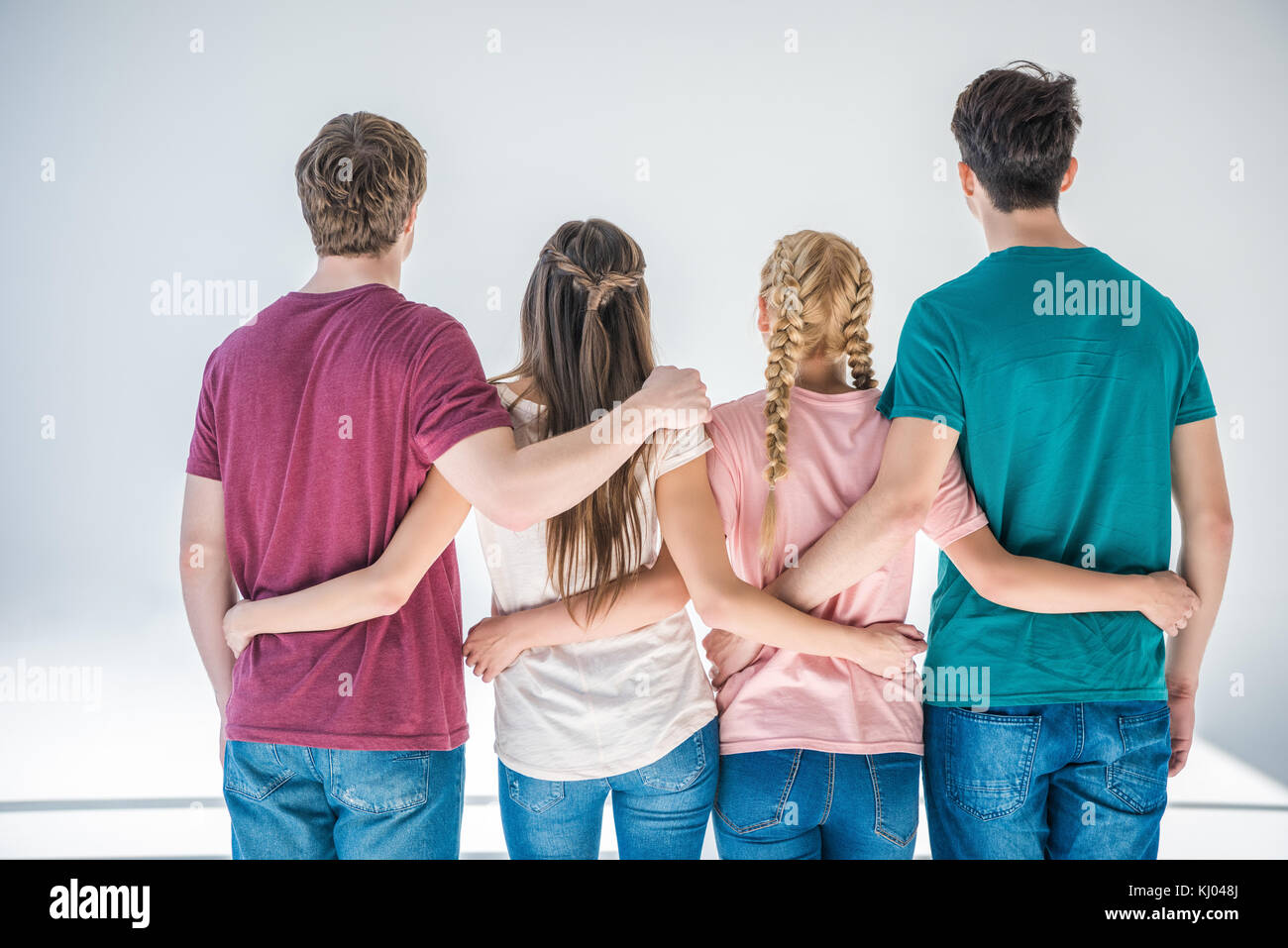 young people standing together Stock Photo - Alamy
